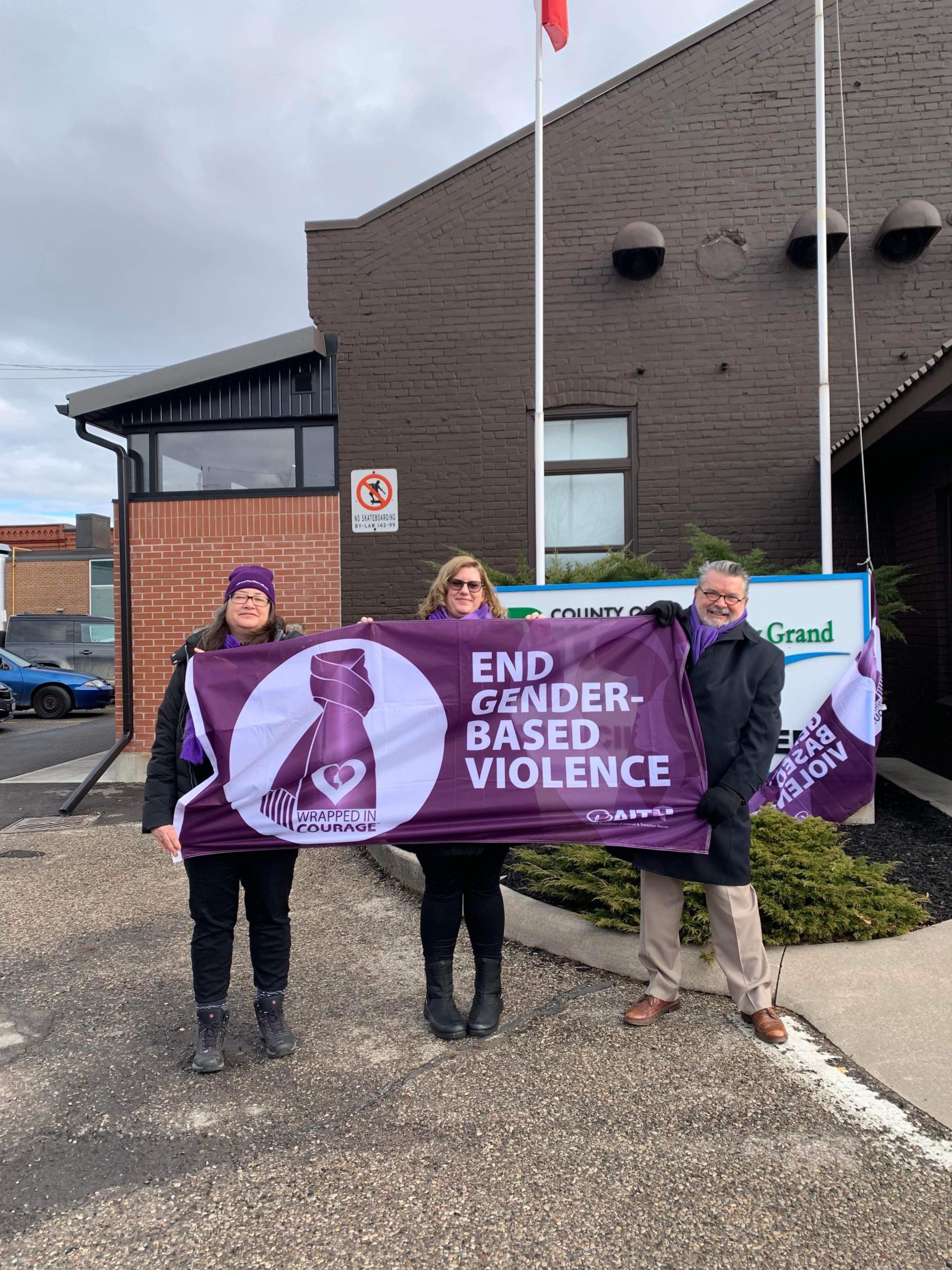 Wrapped in Courage flag raisings bring awareness to gender-based ...